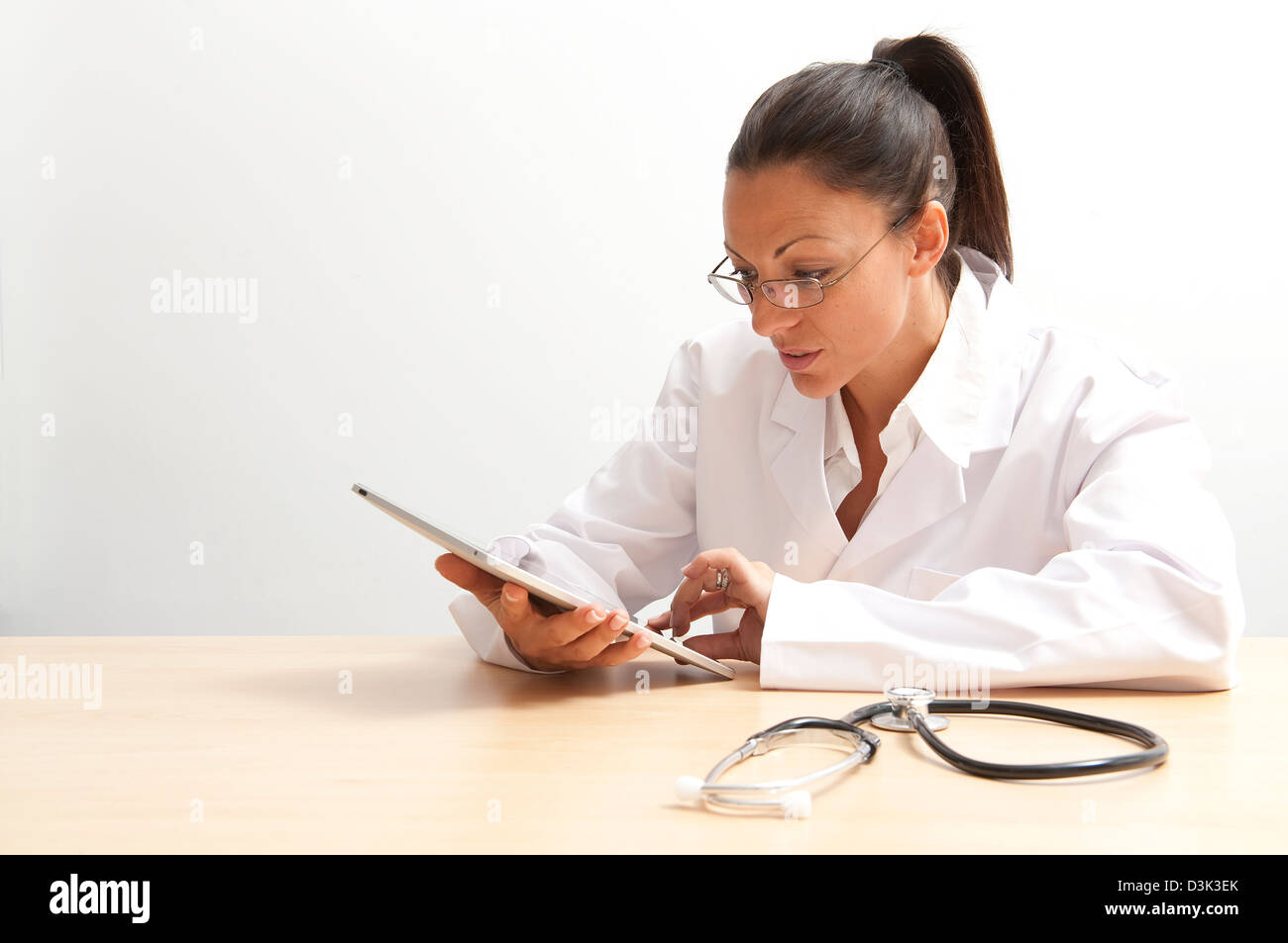 female doctor using ipad tablet computer Stock Photo - Alamy