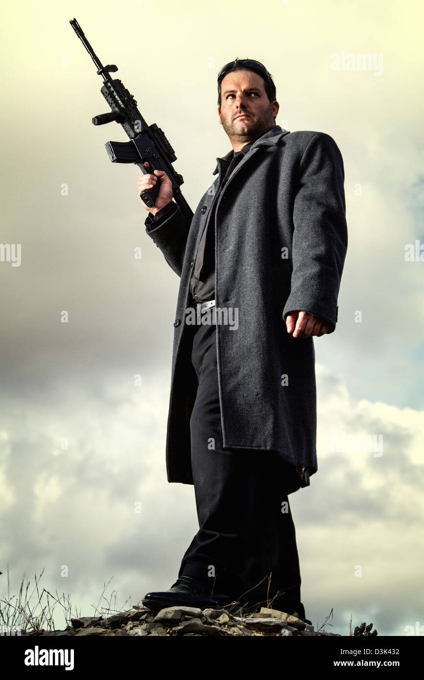View of a contracted type killer agent wandering with a long jacket and ...