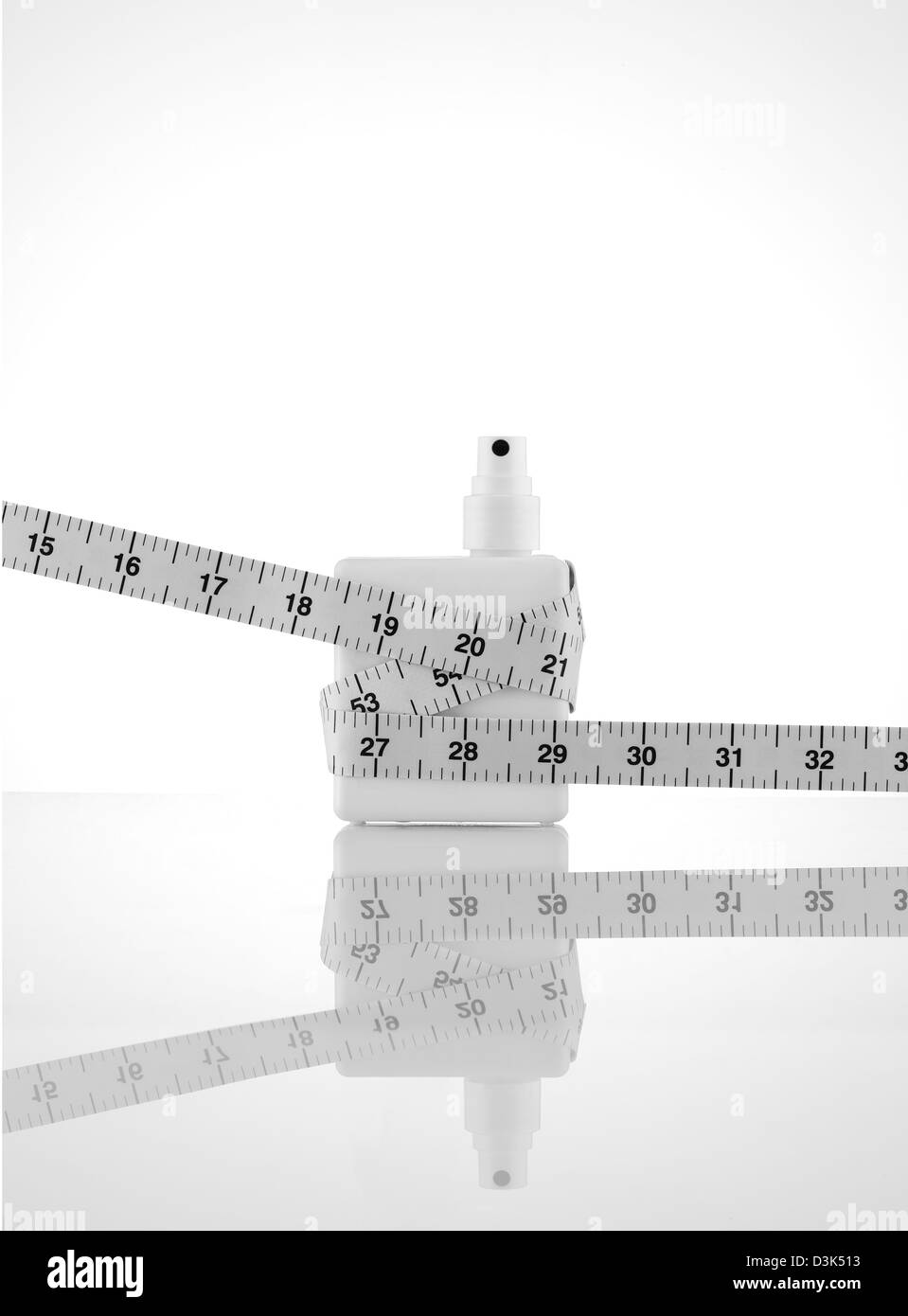 tape measure around spray bottle Stock Photo - Alamy