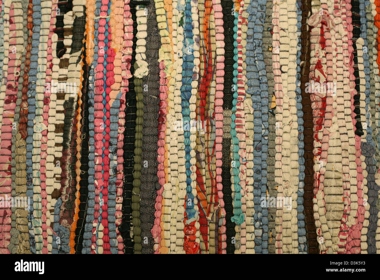 Multi-coloured structure of a carpet connected in manual Stock Photo ...