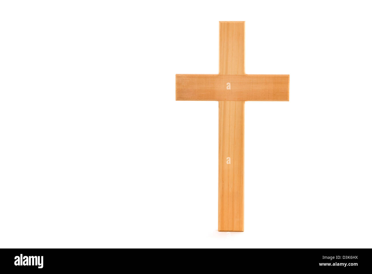 Wooden cross with grain standing on a white background Stock Photo - Alamy