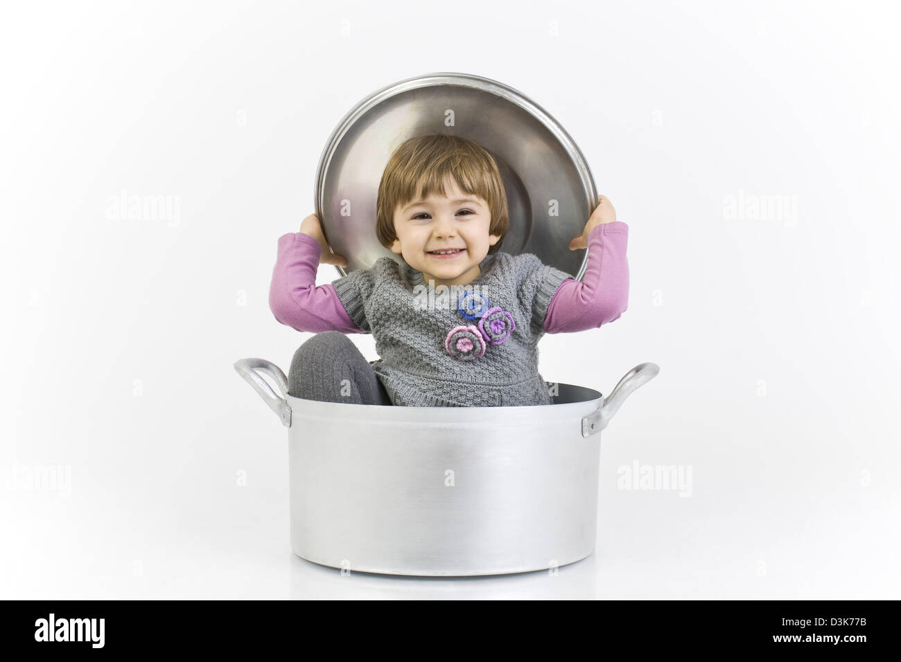 Child in the pot Stock Photo - Alamy