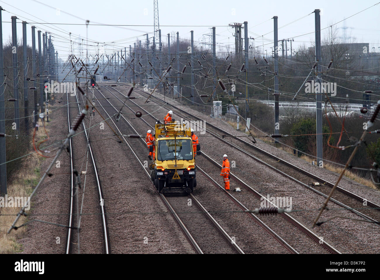 Railway engineers get to work repairing overhead power lines near St ...