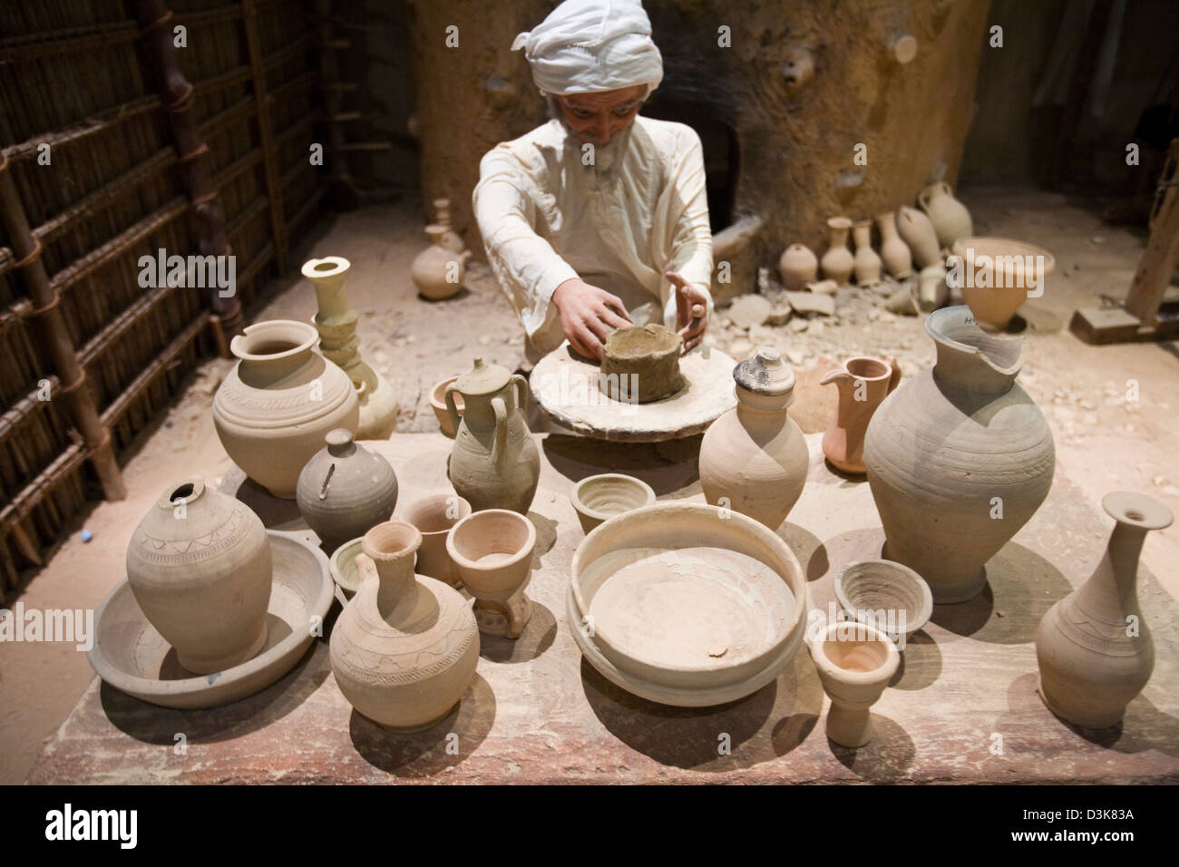 Bahrain pottery potter throwing a pot making pottery middle east hi-res ...