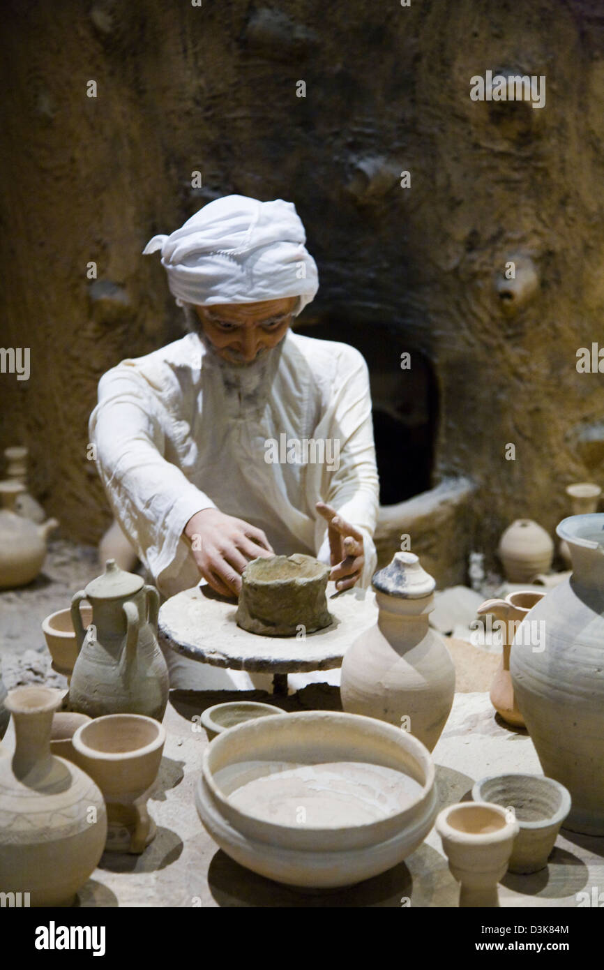 Bahrain pottery potter throwing a pot making pottery middle east hi-res ...