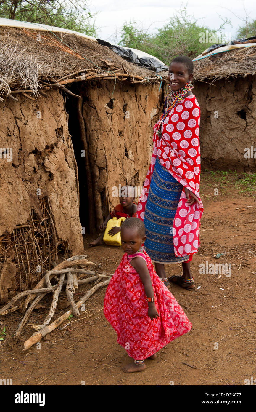 Maasai woman and children in manyatta, Selenkay Conservancy, Kenya ...