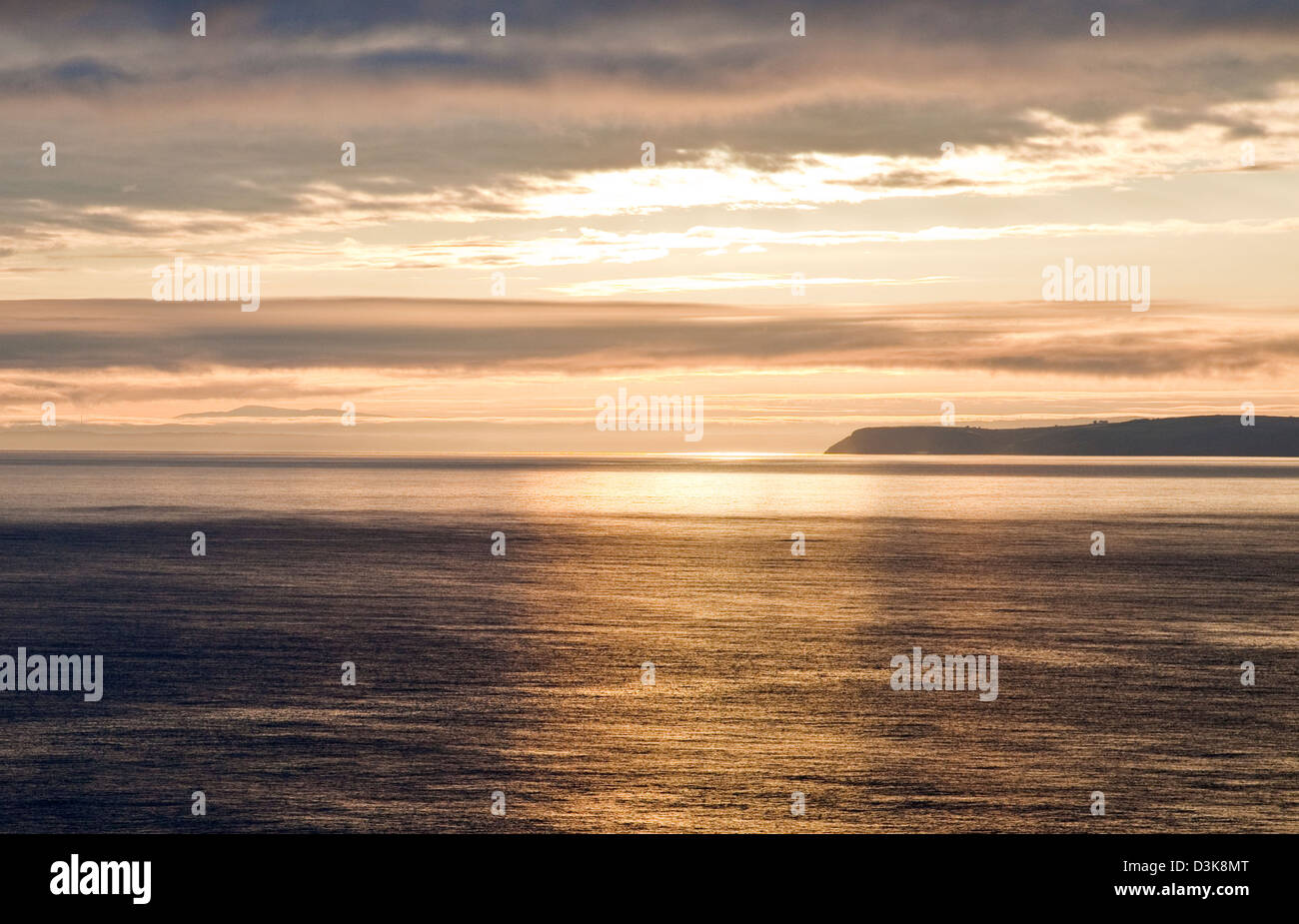 Seascape view golden sunset from Cardigan Coastal Path Mwnt in ...