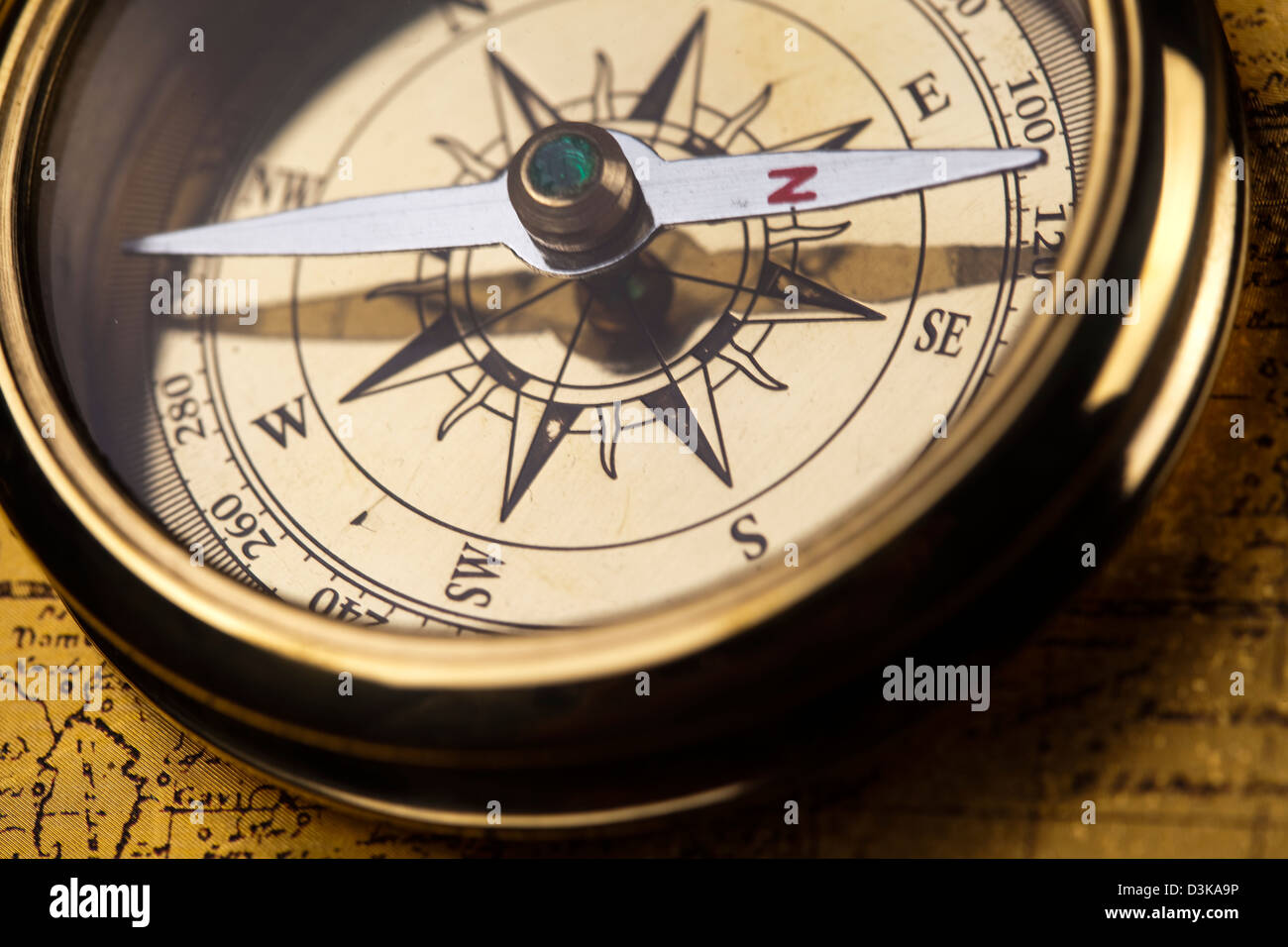 Close up view of the compass on old map Stock Photo - Alamy