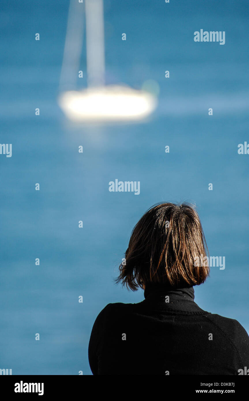 A lady alone with her thoughts Stock Photo - Alamy