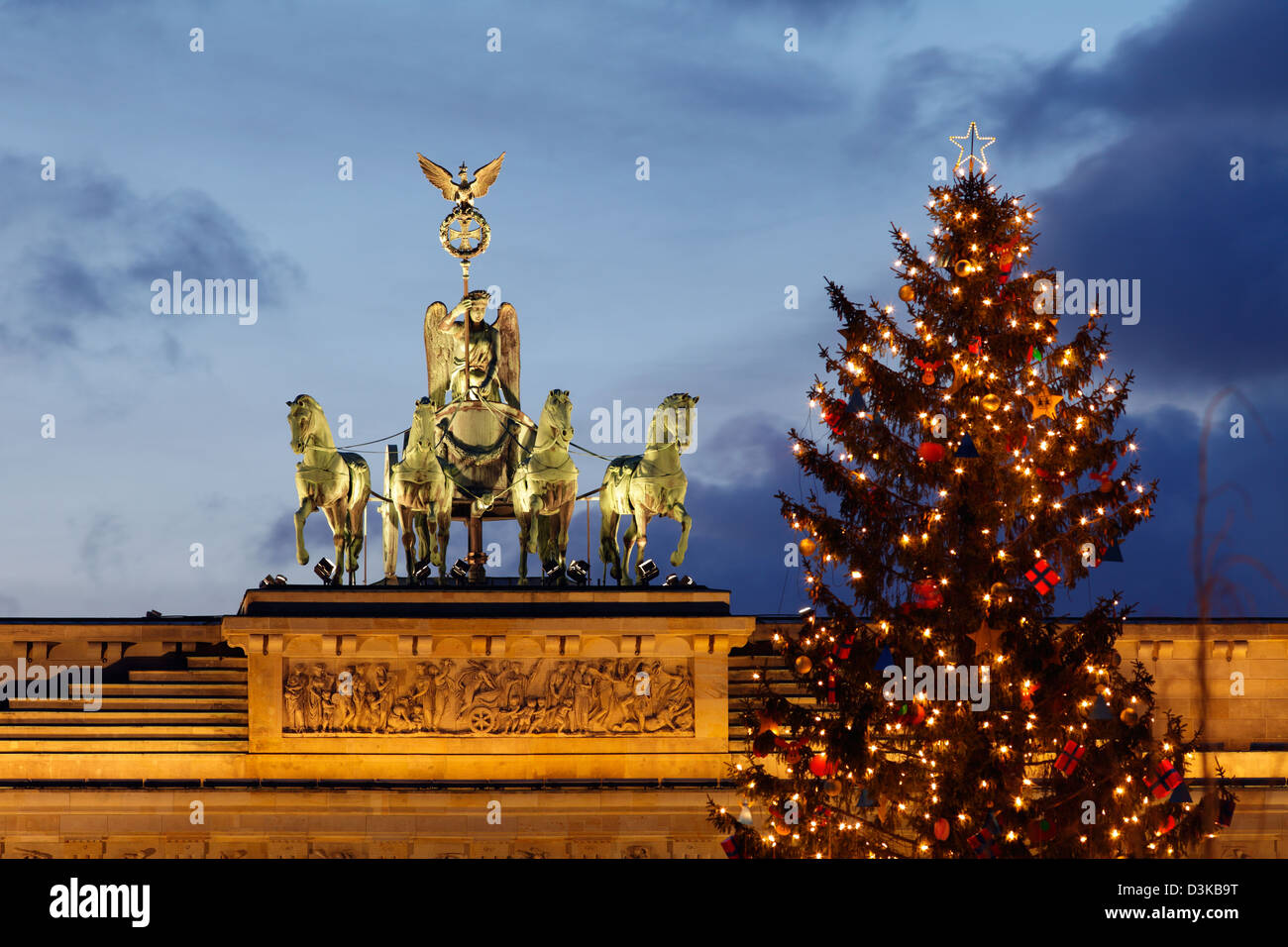 Berlin, Germany, decorated Christmas tree in front of the Brandenburg ...