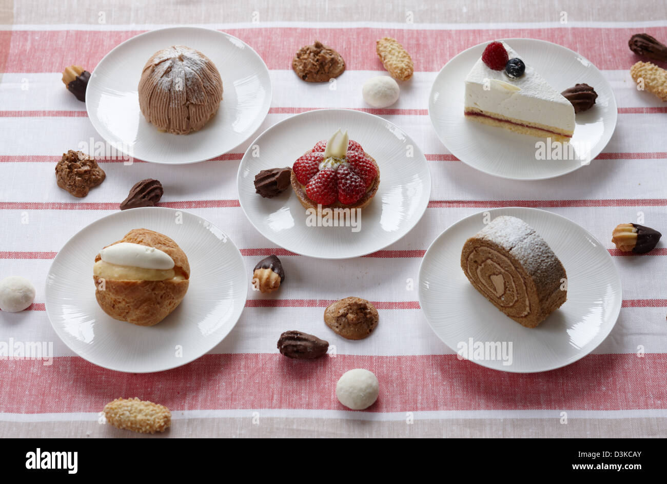 Assorted cakes and pastry on a table Stock Photo - Alamy