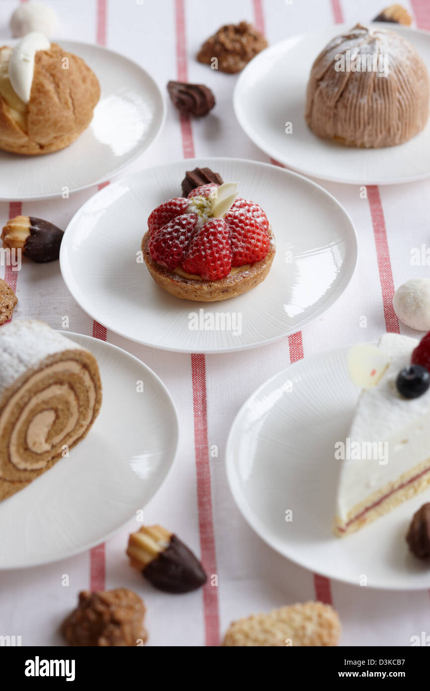 Assorted cakes and pastry on a table Stock Photo - Alamy