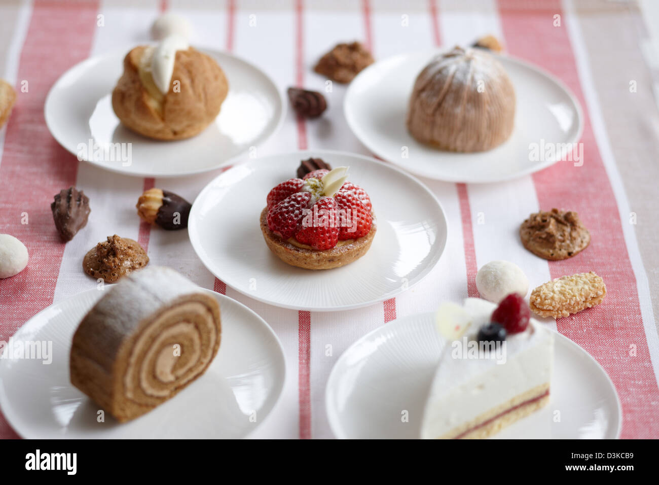 Assorted cakes and pastry on a table Stock Photo - Alamy