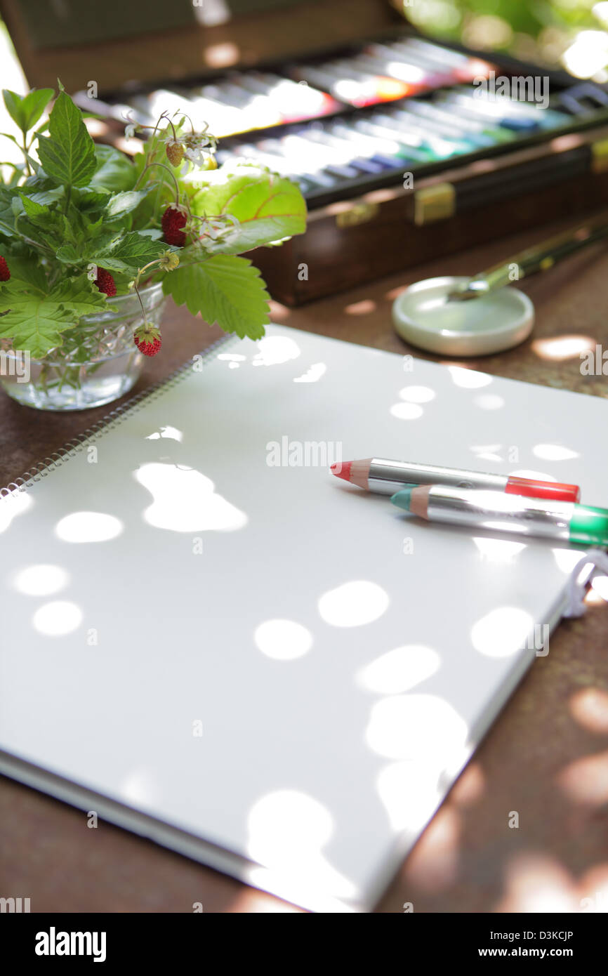 Drawing tools and art supplies on a table Stock Photo - Alamy