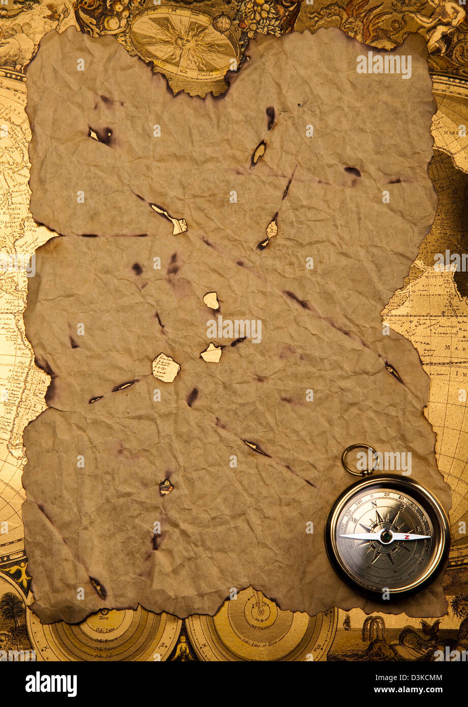 Old style compass and paper background Stock Photo - Alamy