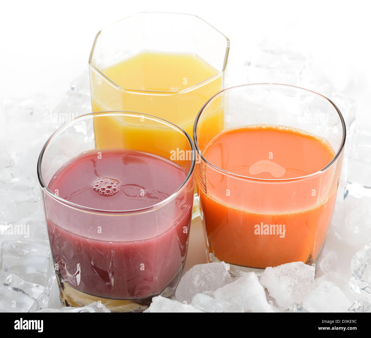 Fresh Fruit And Vegetable Juice With Ice Cubes Stock Photo - Alamy