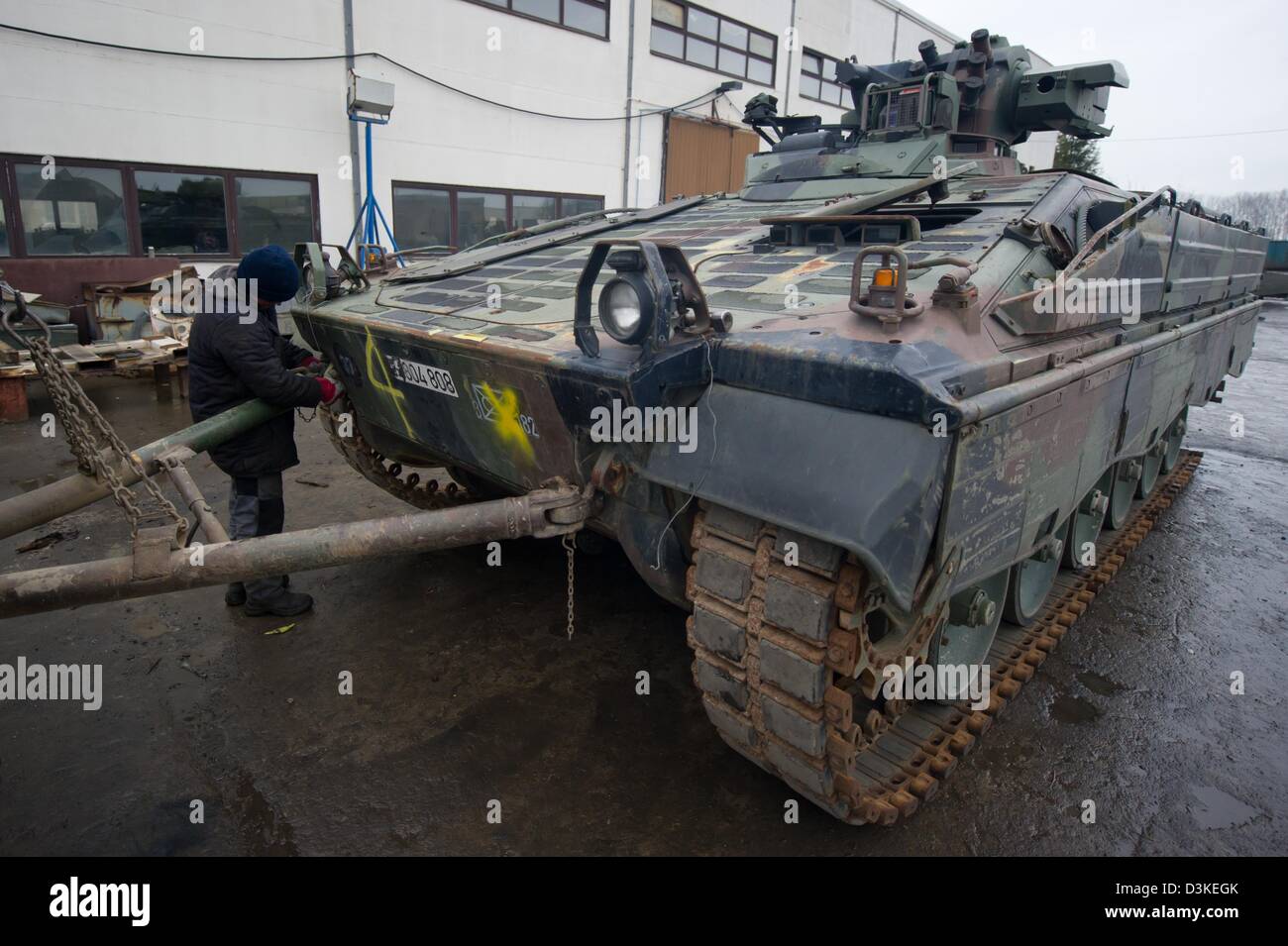 An employee of a company specialising in demilitarisation and the ...