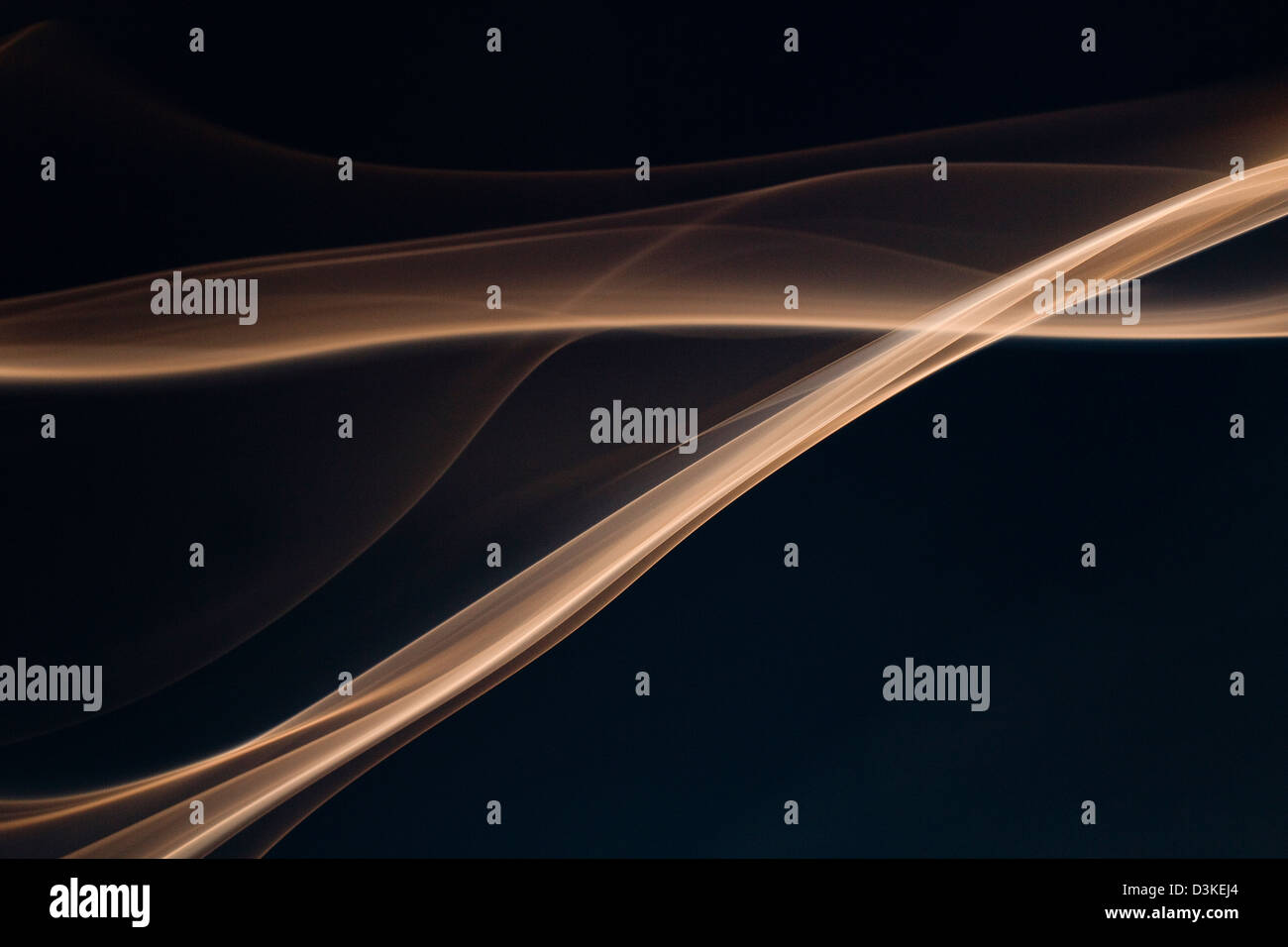 Orange smoke on black background Stock Photo - Alamy