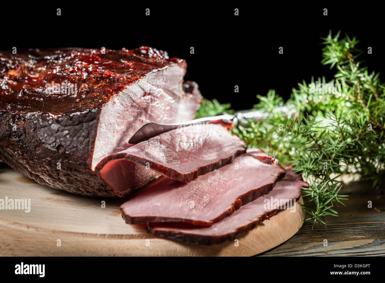 Piece of sliced smoked ham Stock Photo - Alamy
