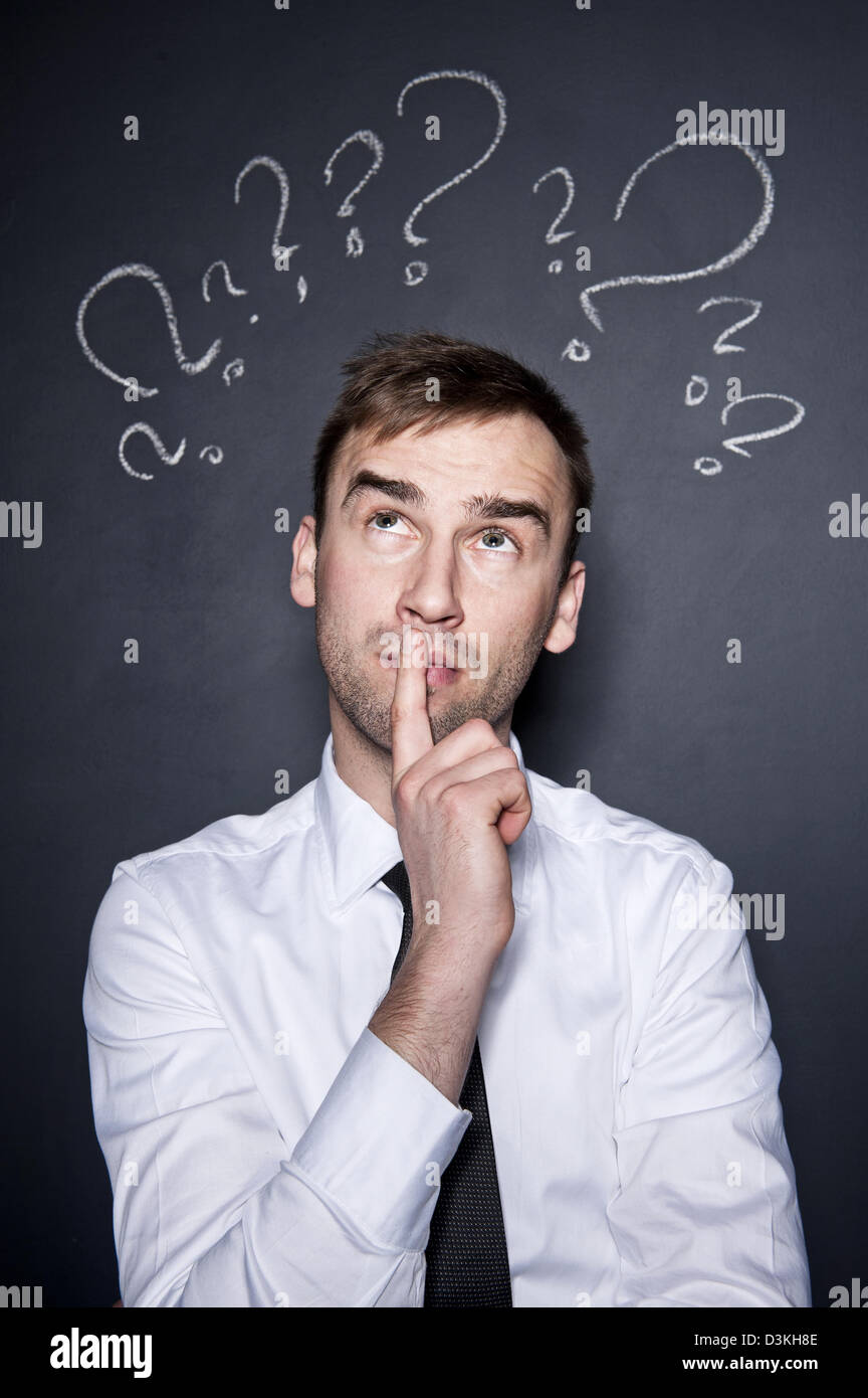 Question mark suit hi-res stock photography and images - Alamy