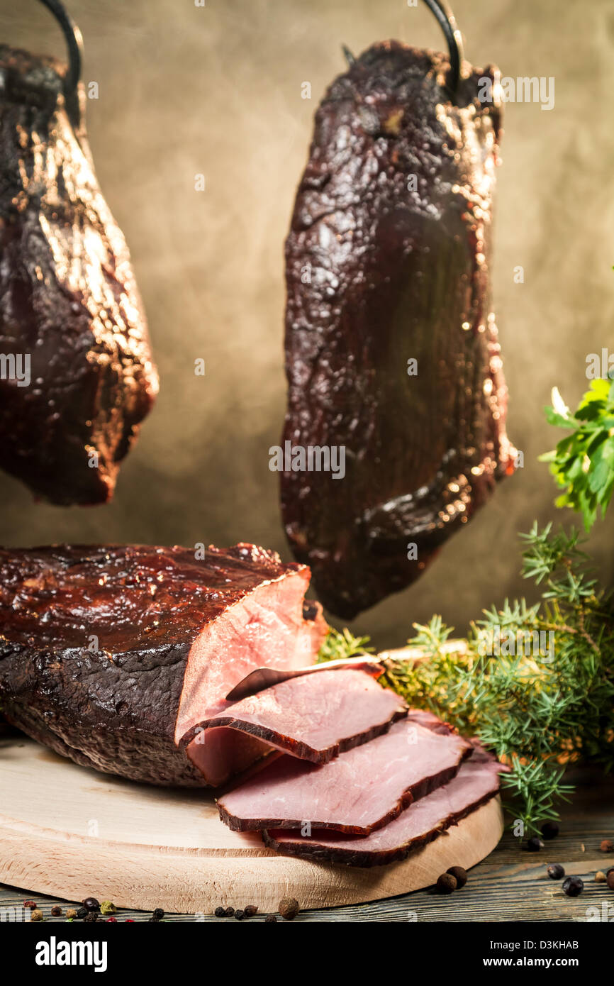 Closeup of smoked ham in a traditional rural way Stock Photo - Alamy