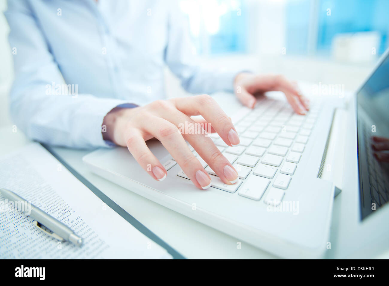 Hands of white collar worker typing on laptop keypad Stock Photo - Alamy