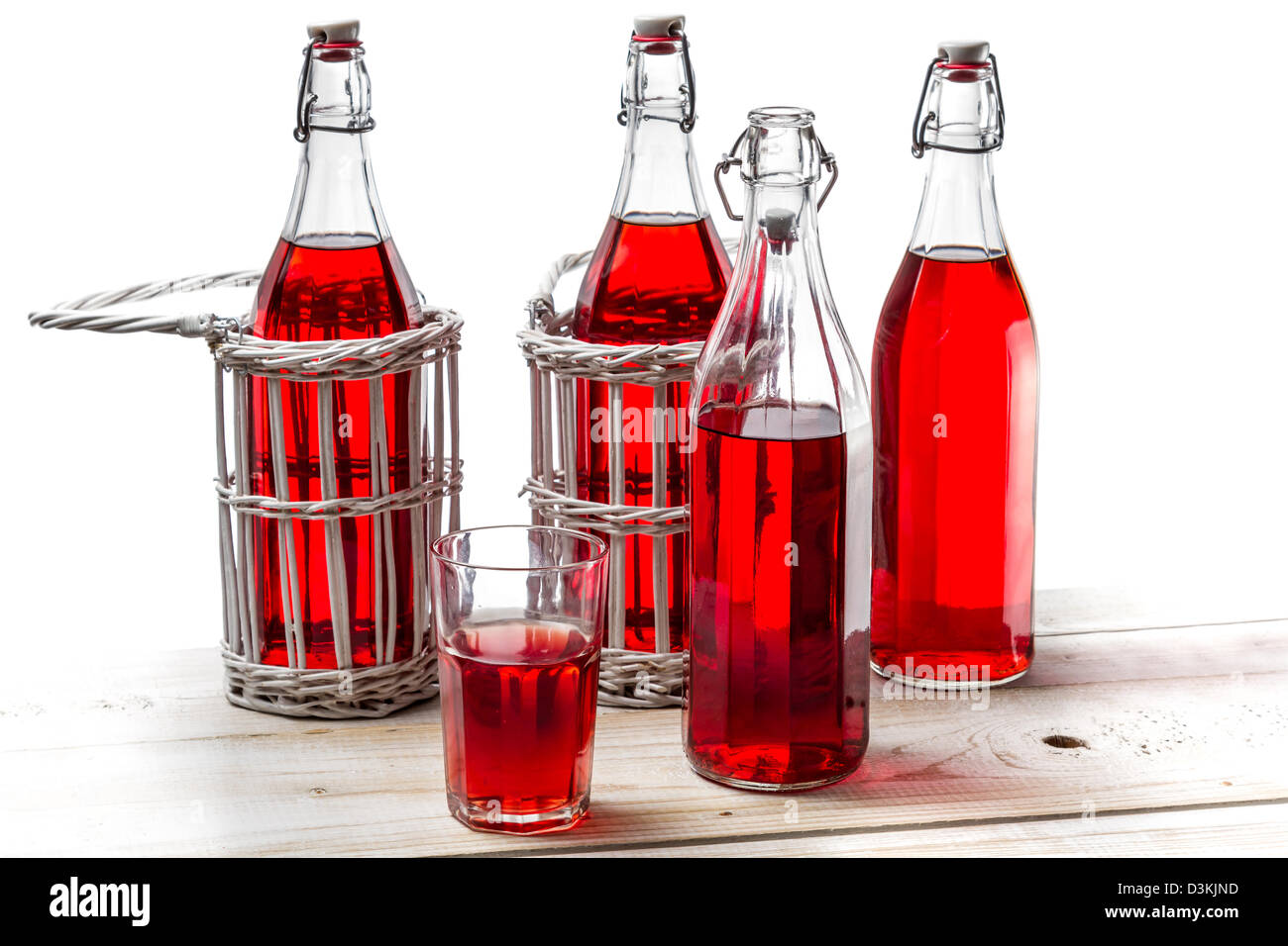 Vintage bottles with red juice Stock Photo - Alamy