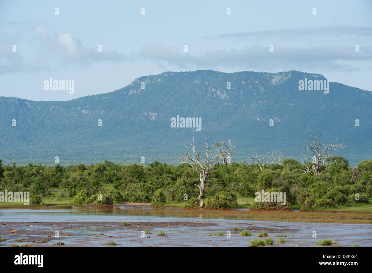 Voi river in flood in front of Taita Hills, Tsavo East National Park ...