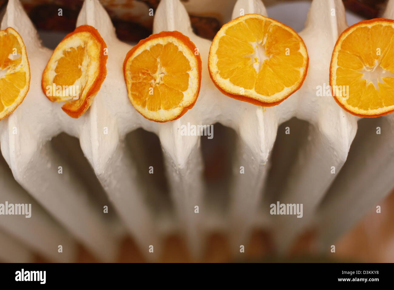 Dry orange slices placed on radiator in Bucharest, Romania Stock Photo ...