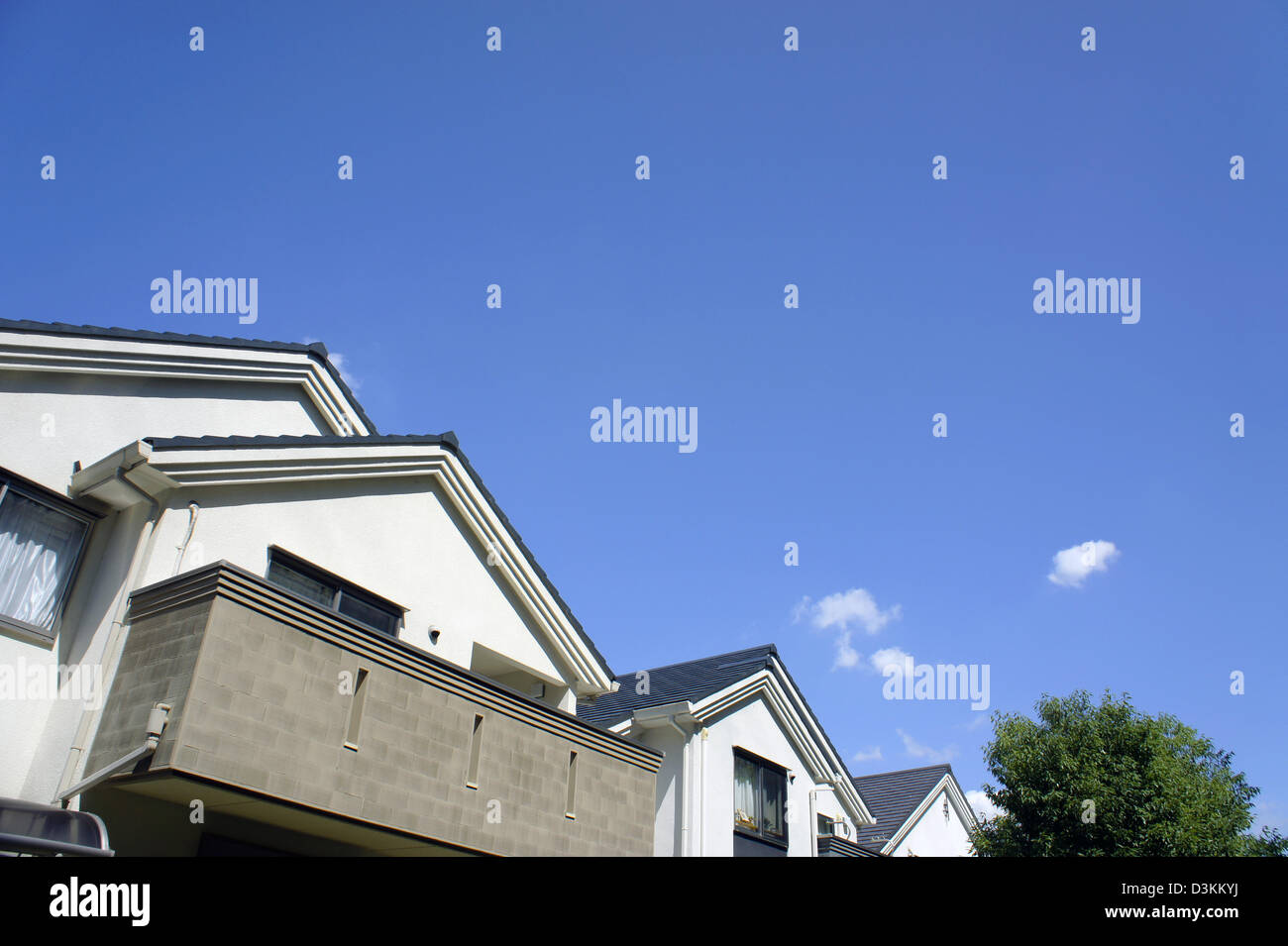 Residential area and blue sky with clouds Stock Photo - Alamy