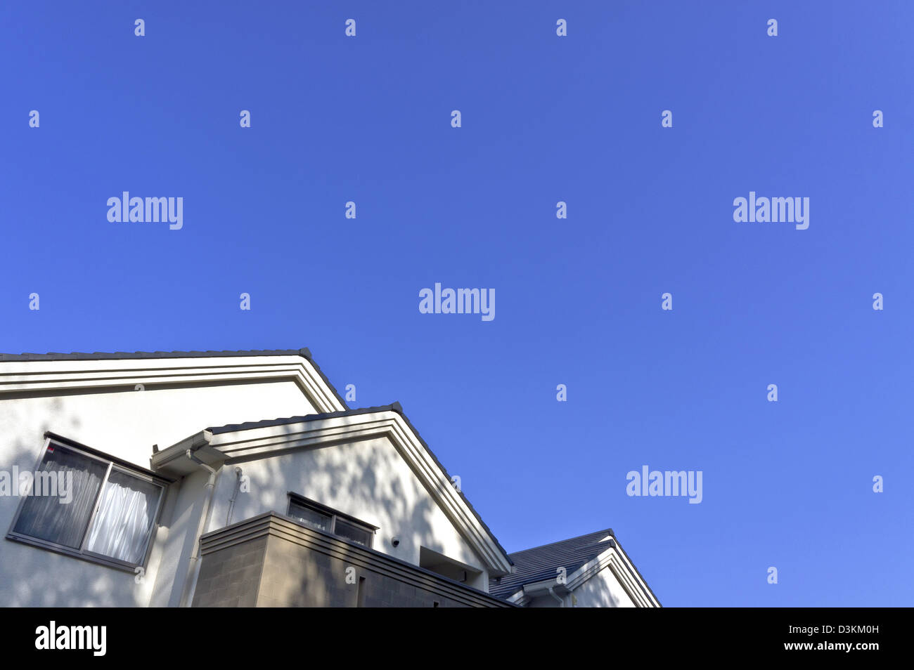 House and blue sky Stock Photo - Alamy