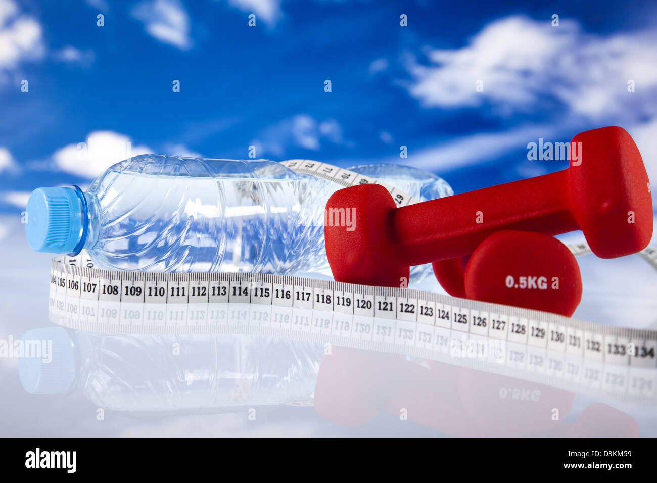 Measuring of dumbbell Stock Photo - Alamy