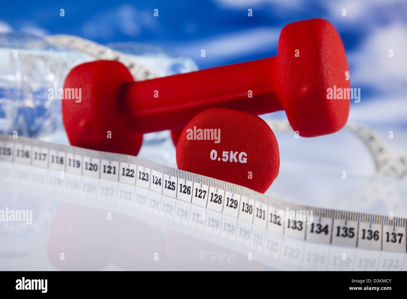 Measuring of dumbbell Stock Photo - Alamy