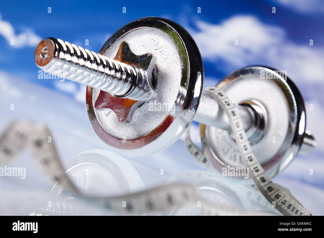 Measuring of dumbbell Stock Photo - Alamy
