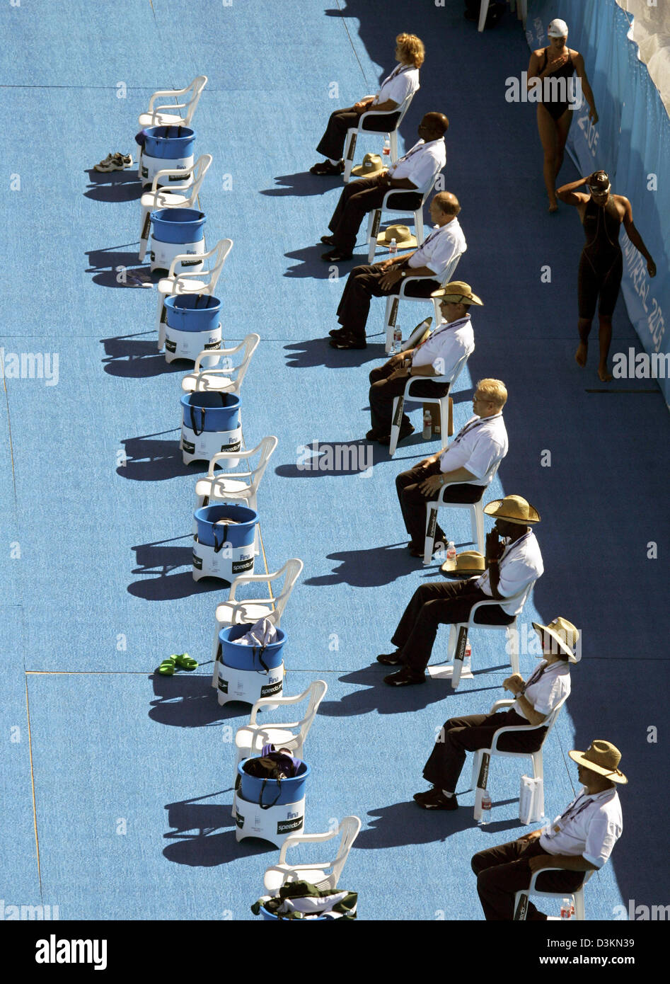 Referees of the preliminaries await the beginning of the competition at ...