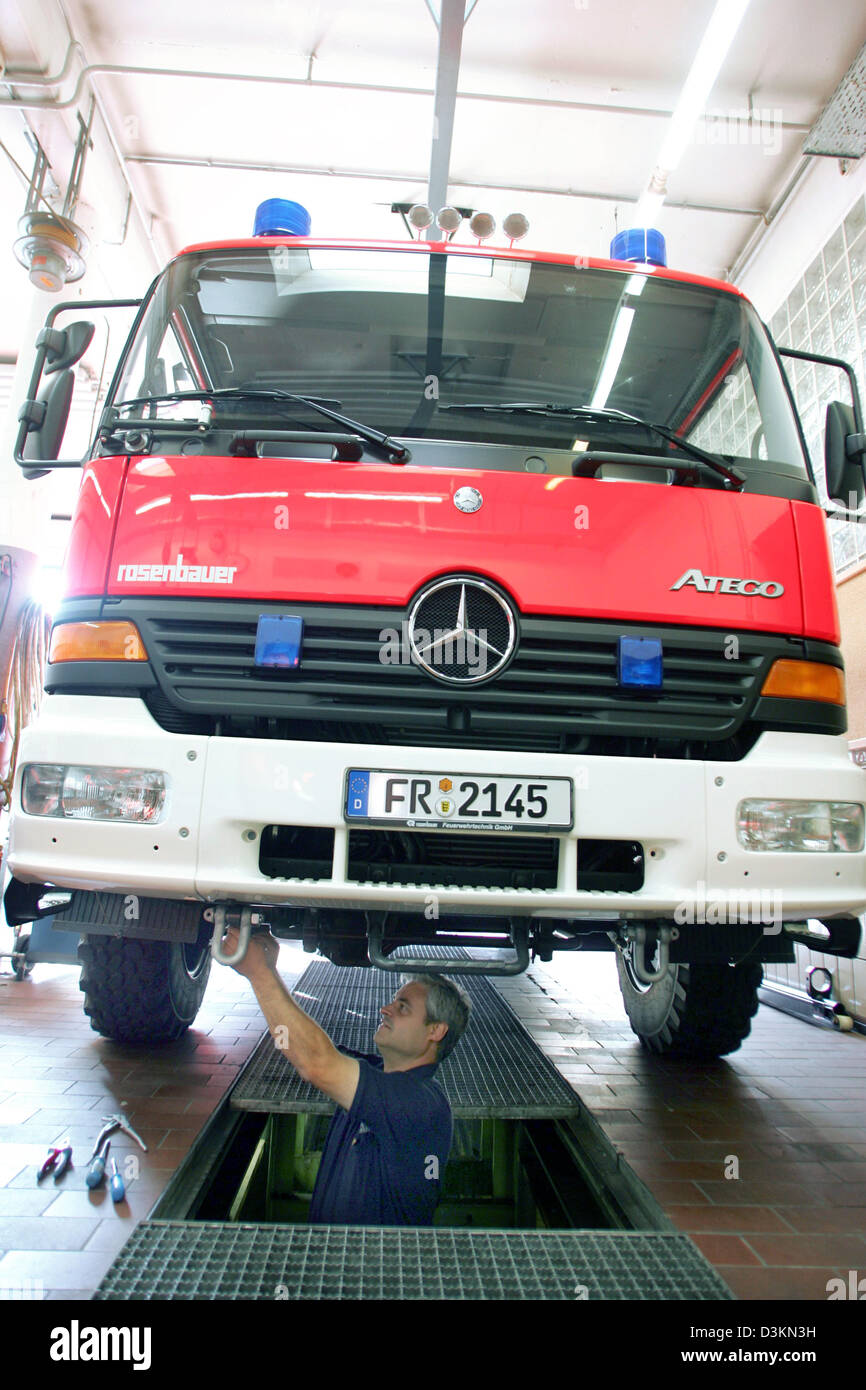 (dpa) - The head mechanic of the professional fire brigade is pictured ...