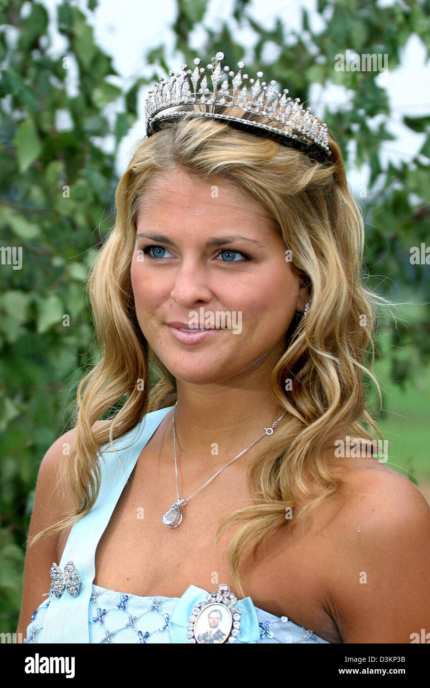 (dpa) - Princess Madeleine of Sweden smiles at the wedding ceremony of ...