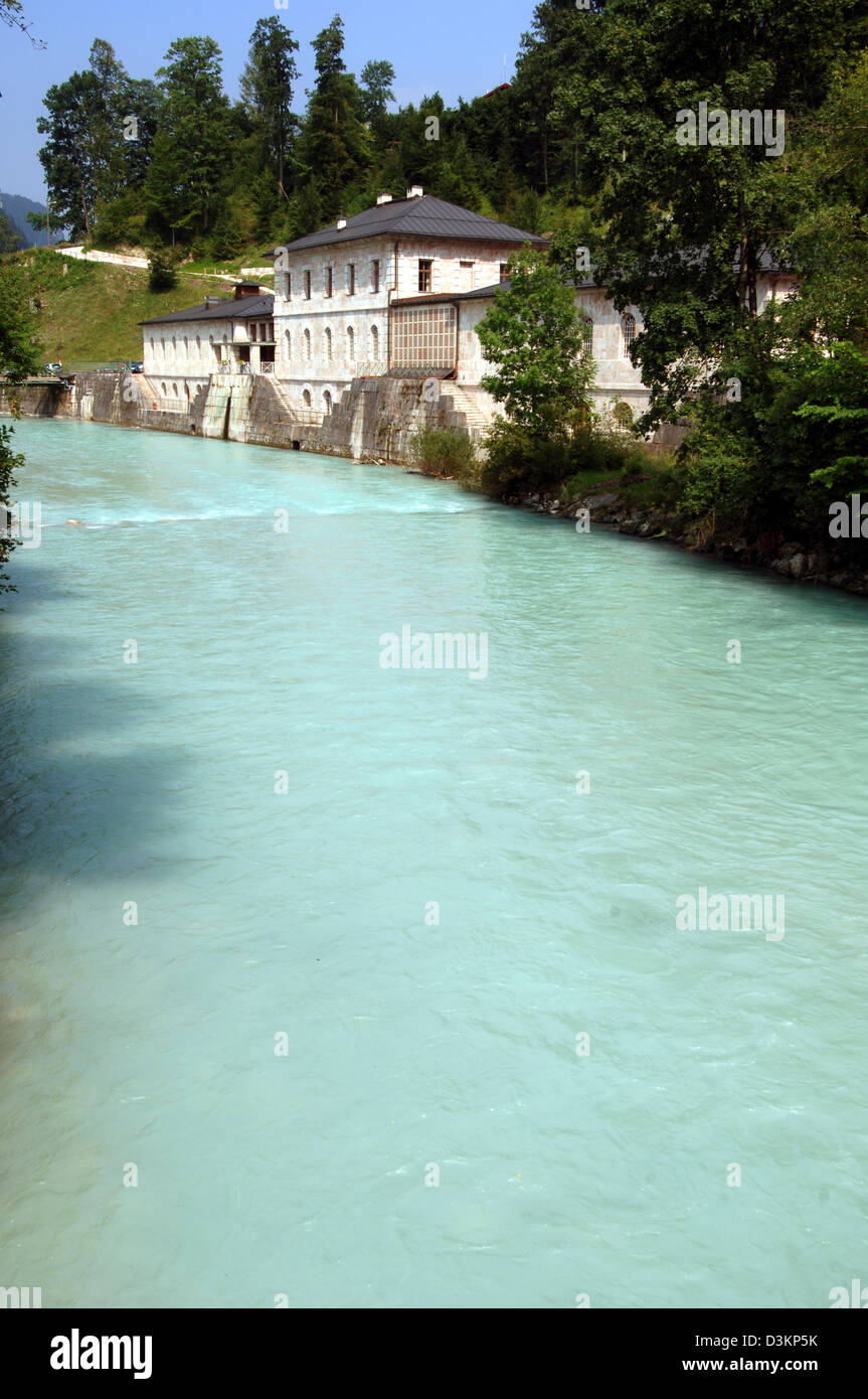 (dpa) - The picture shows the river Ache passing a building of the salt ...