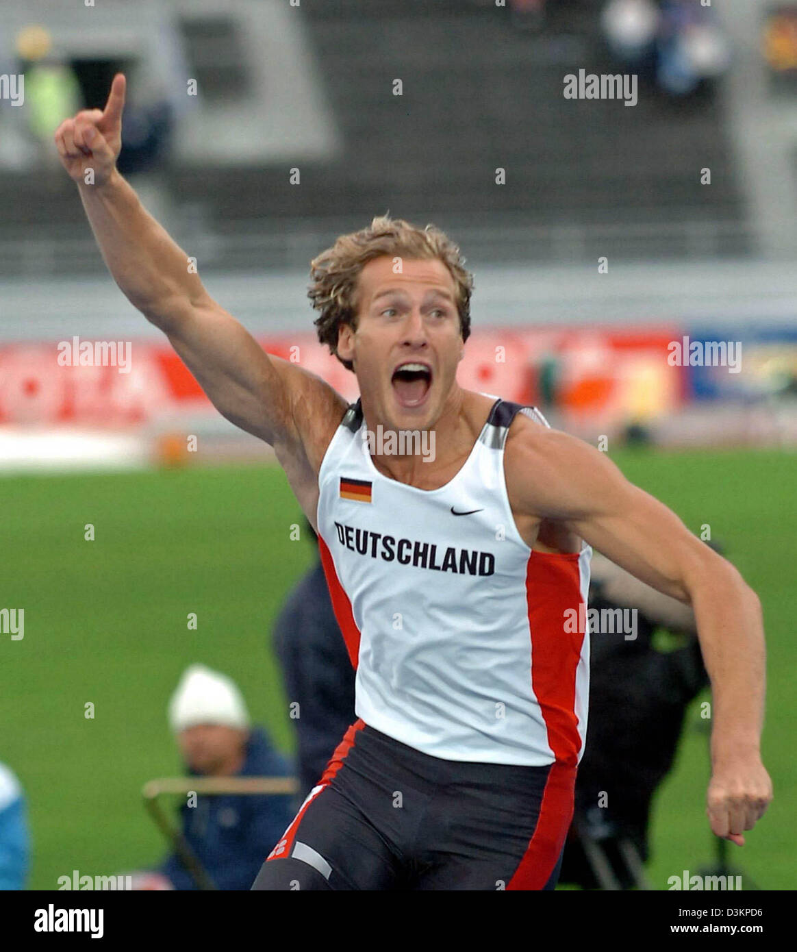 (dpa) - German athlete Andre Niklaus cheers after his attempt in the ...