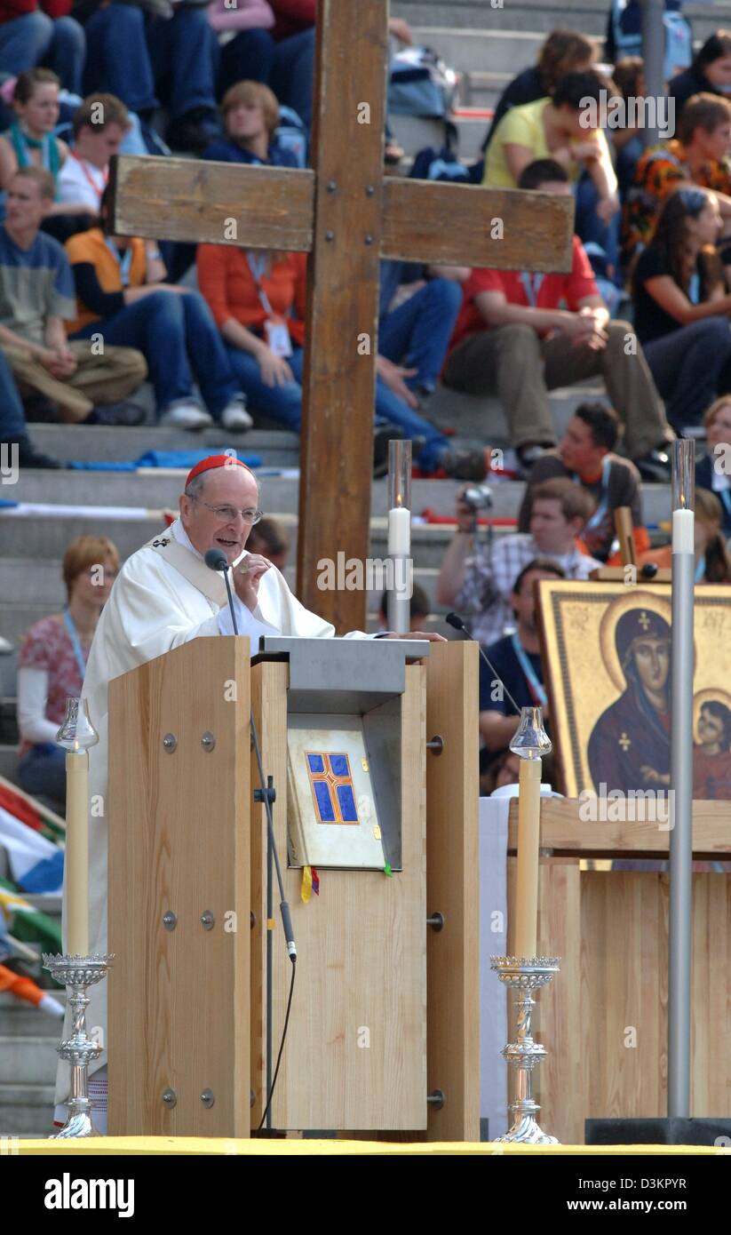 (dpa) - Cardinal Joachim Meisner talks to the pilgrims at one of three ...