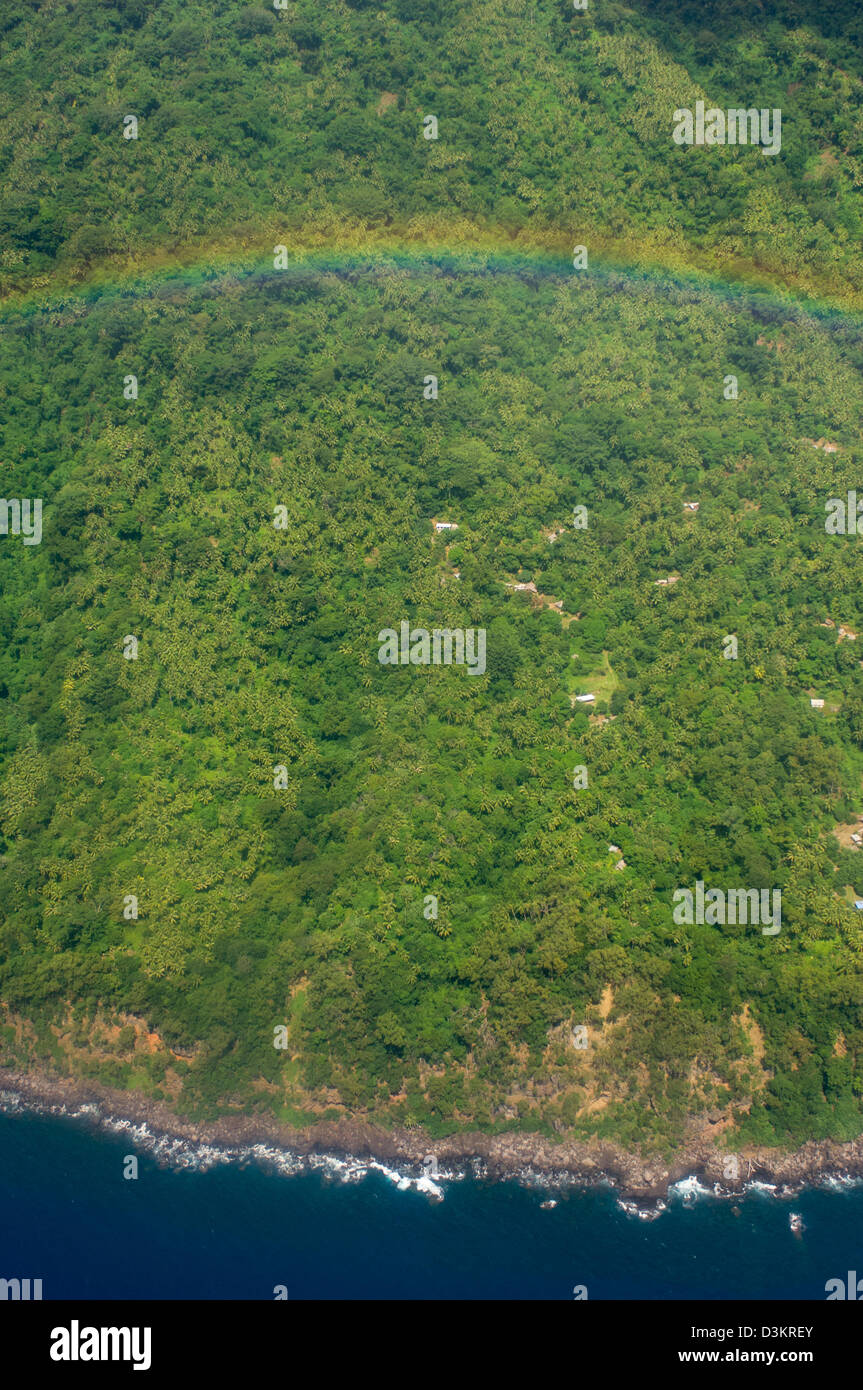 Rainbow over the forested interior of Ambae Island, showing the rugged ...
