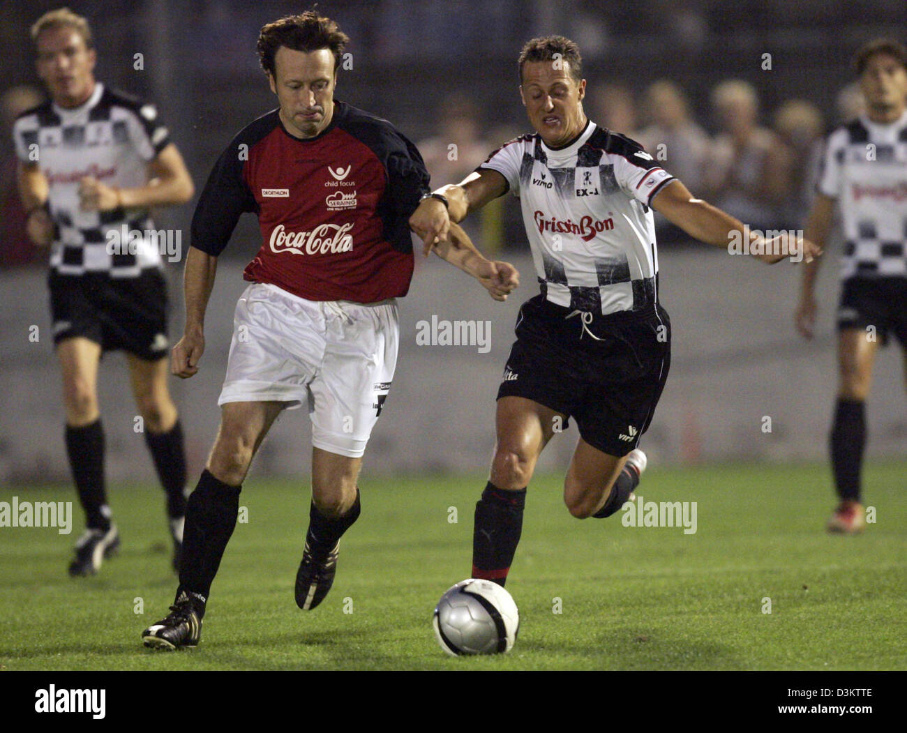 (dpa) - German Formula One driver Michael Schumacher (R) of Ferrari and ...