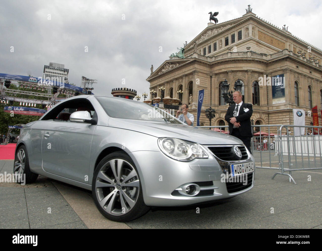 (dpa) - Volkswagen's new 'EOS convertible' rolls in front of the Old ...