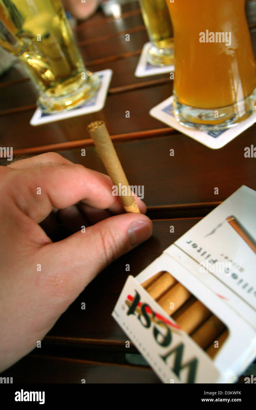 With small cigar hi-res stock photography and images - Alamy