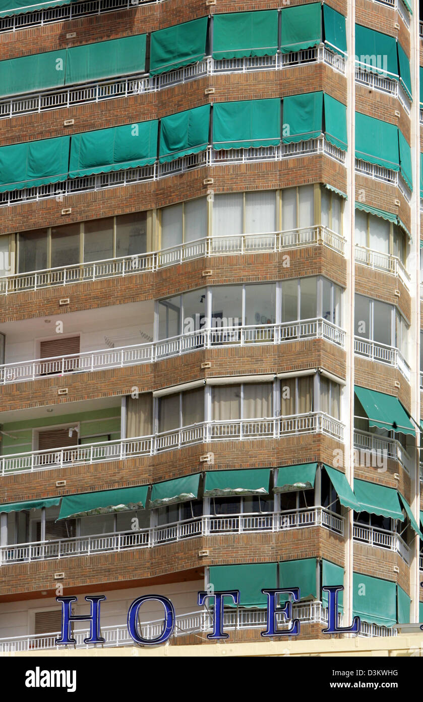 The writing 'Hotel' is pictured in front of the facade of a hotel in ...