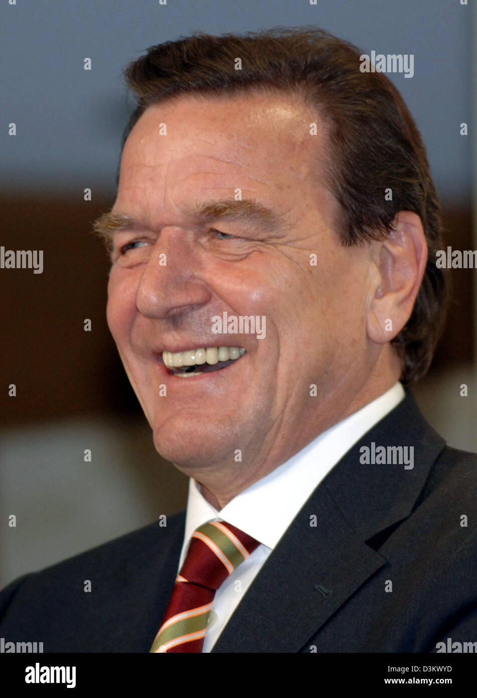(dpa) - German Chancellor Gerhard Schroeder smiles pictured during the ...