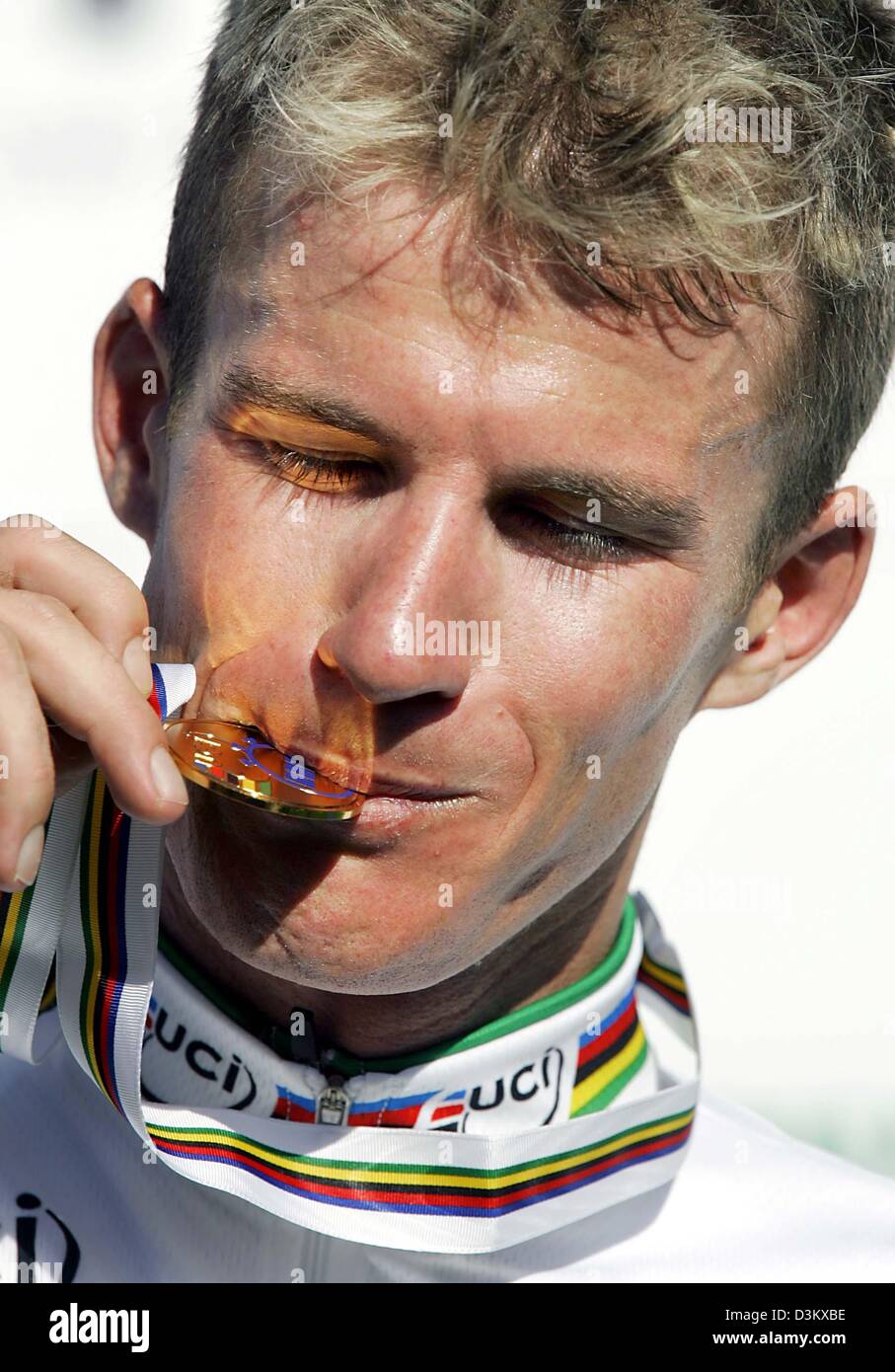 Sports spo cycling biting gold medal winning spain hi-res stock ...