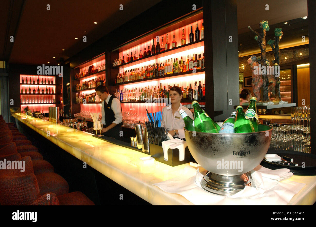 (dpa)- Bar tenders work behind the counter of the 'Fifty-Nine-Bar' at ...
