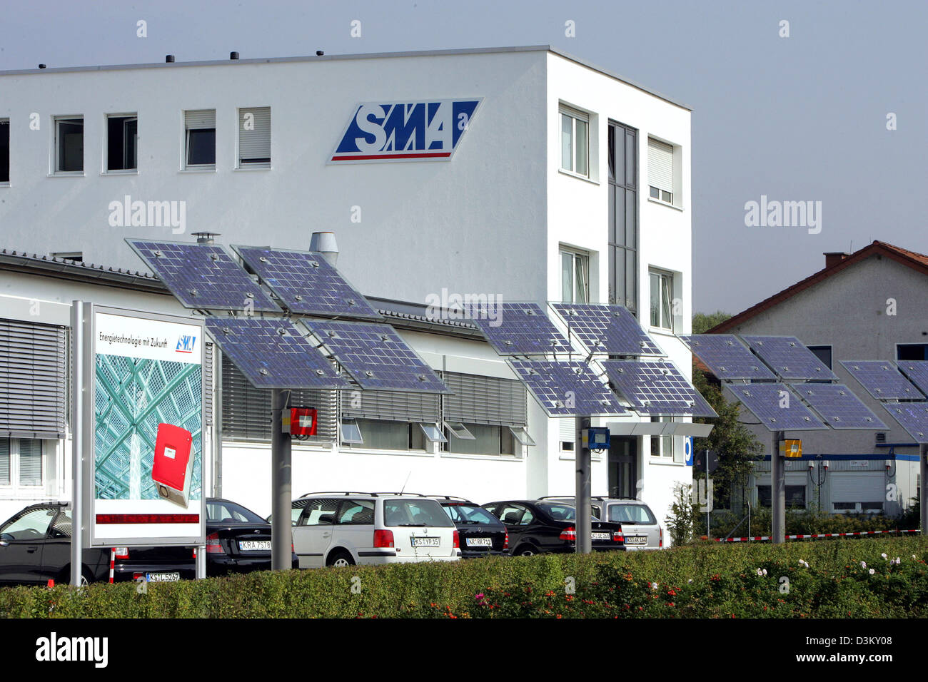(dpa) - Photovoltaic installtions stand in a row in front of the ...