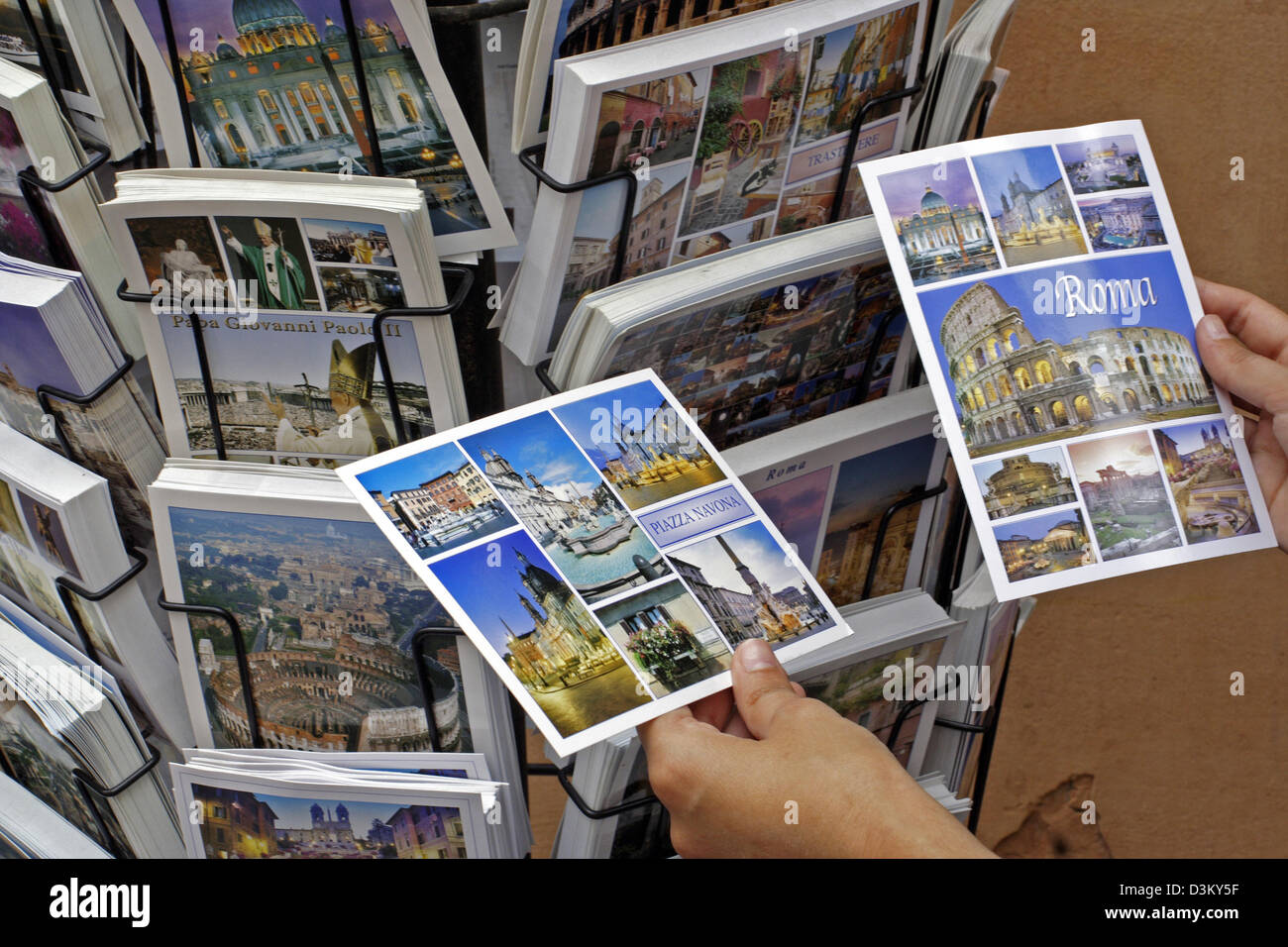 (dpa) - The picture shows a postcard rack in Rome, Italy, 17 September ...
